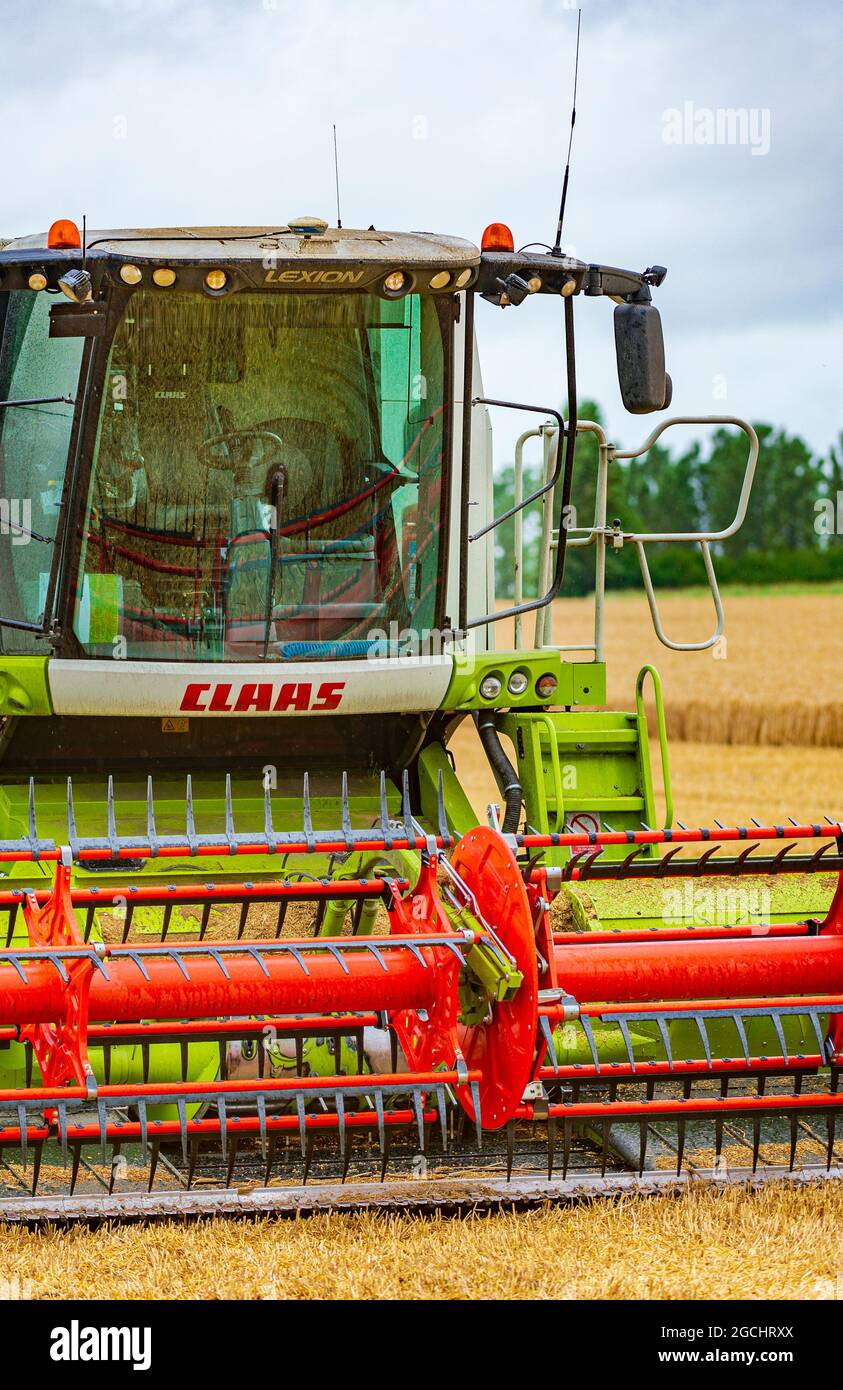 Class 750 Lexion combine harvesters parked up on a stubble field ...