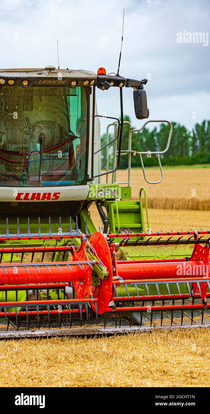 Class 750 Lexion combine harvesters parked up on a stubble field ...