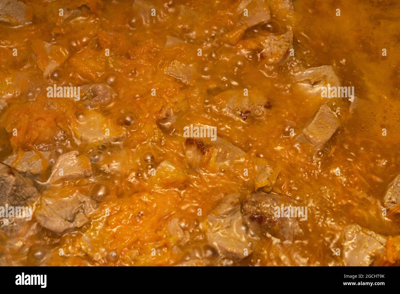 cooking meat gravy, recipe for cooking pilaf Stock Photo - Alamy