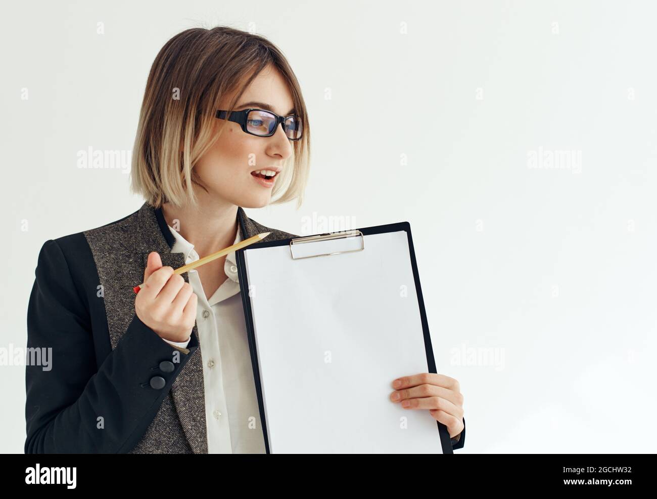 Business woman wearing glasses documents office professional light ...