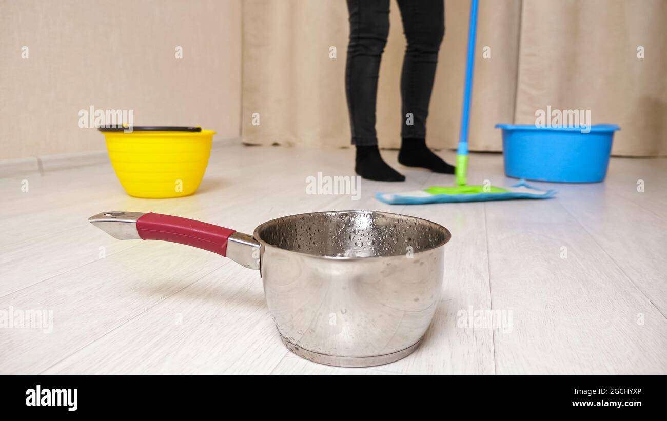 Water flows from pipe bucket hi-res stock photography and images - Alamy