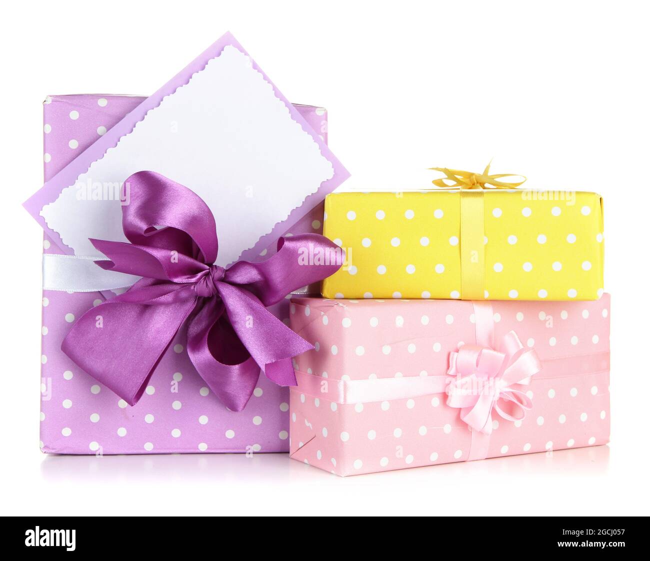 Gift boxes with blank label isolated on white Stock Photo - Alamy