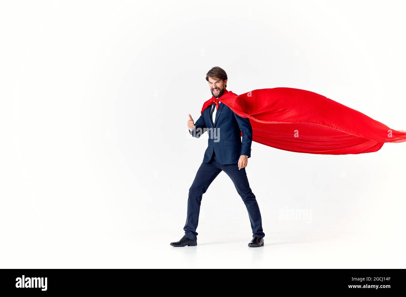 business man in red cloak protecting the city superhero work Stock ...