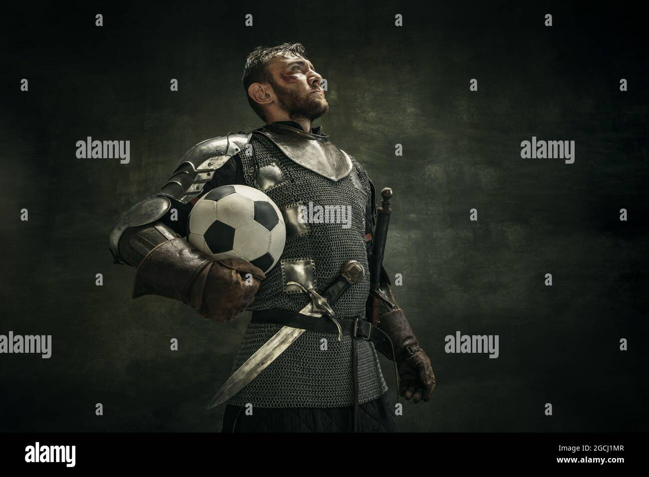 Portrait of one brutal bearded man, medeival warrior or knight with ...