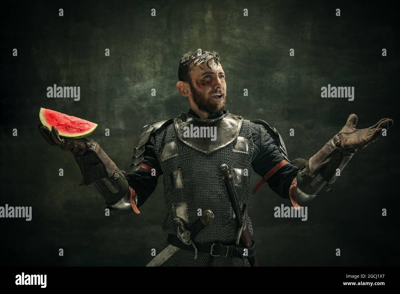 Portrait of one brutal bearded man, medeival warrior or knight with ...