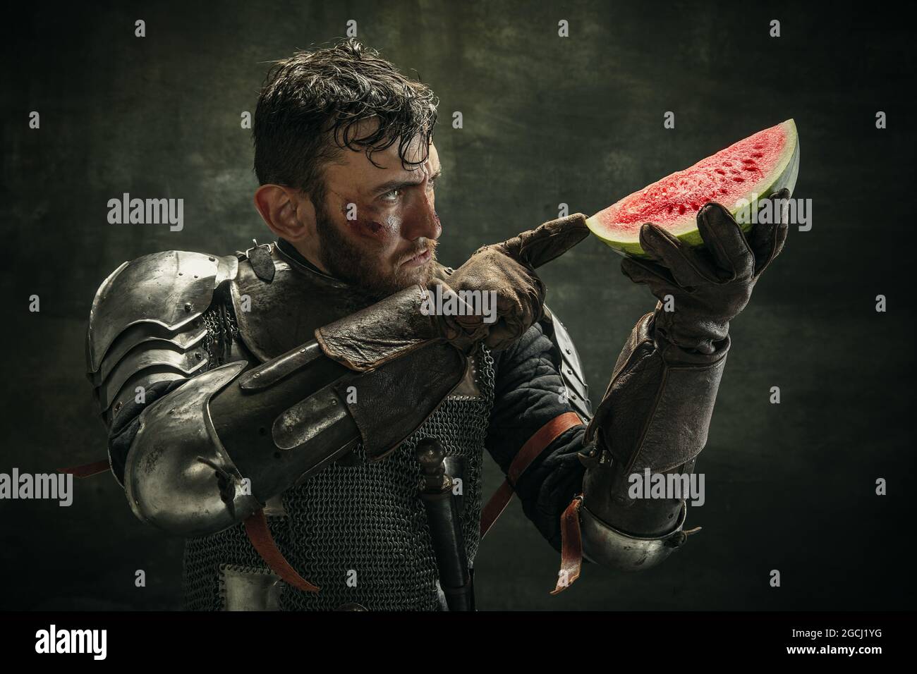 Portrait of one brutal bearded man, medeival warrior or knight with ...