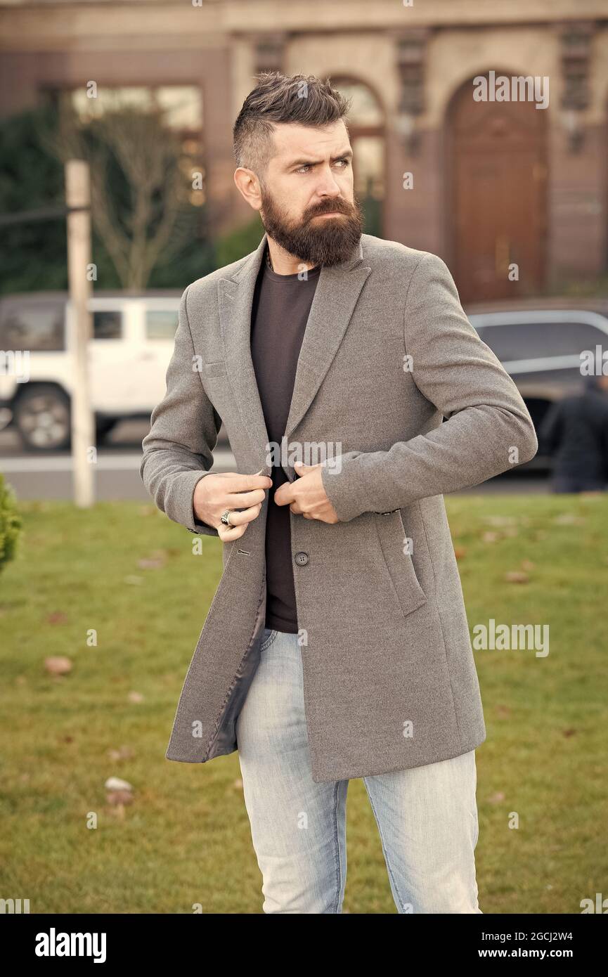 brutal mature bearded man with moustache walking outdoor in trendy ...
