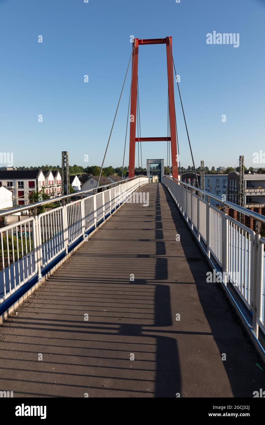 Modern footbridge over railway tracks in Holzwickede, Germany Stock ...
