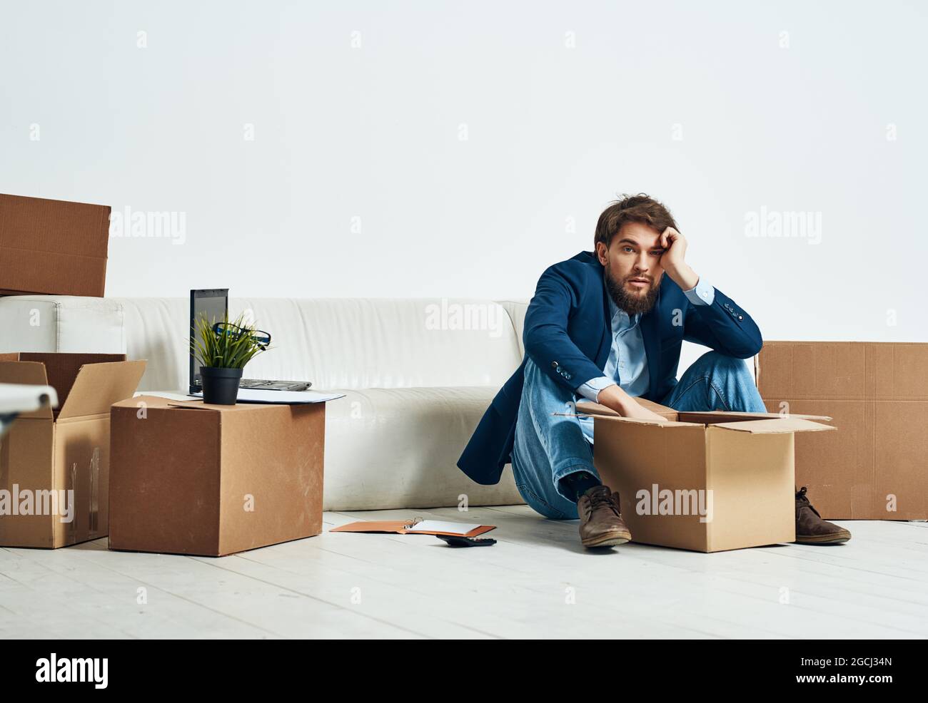 business man in the office unpacking things work manager Stock Photo ...