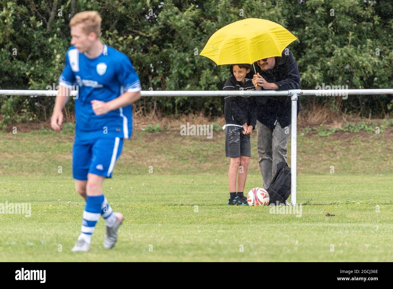 Father and son watching football hi-res stock photography and images ...