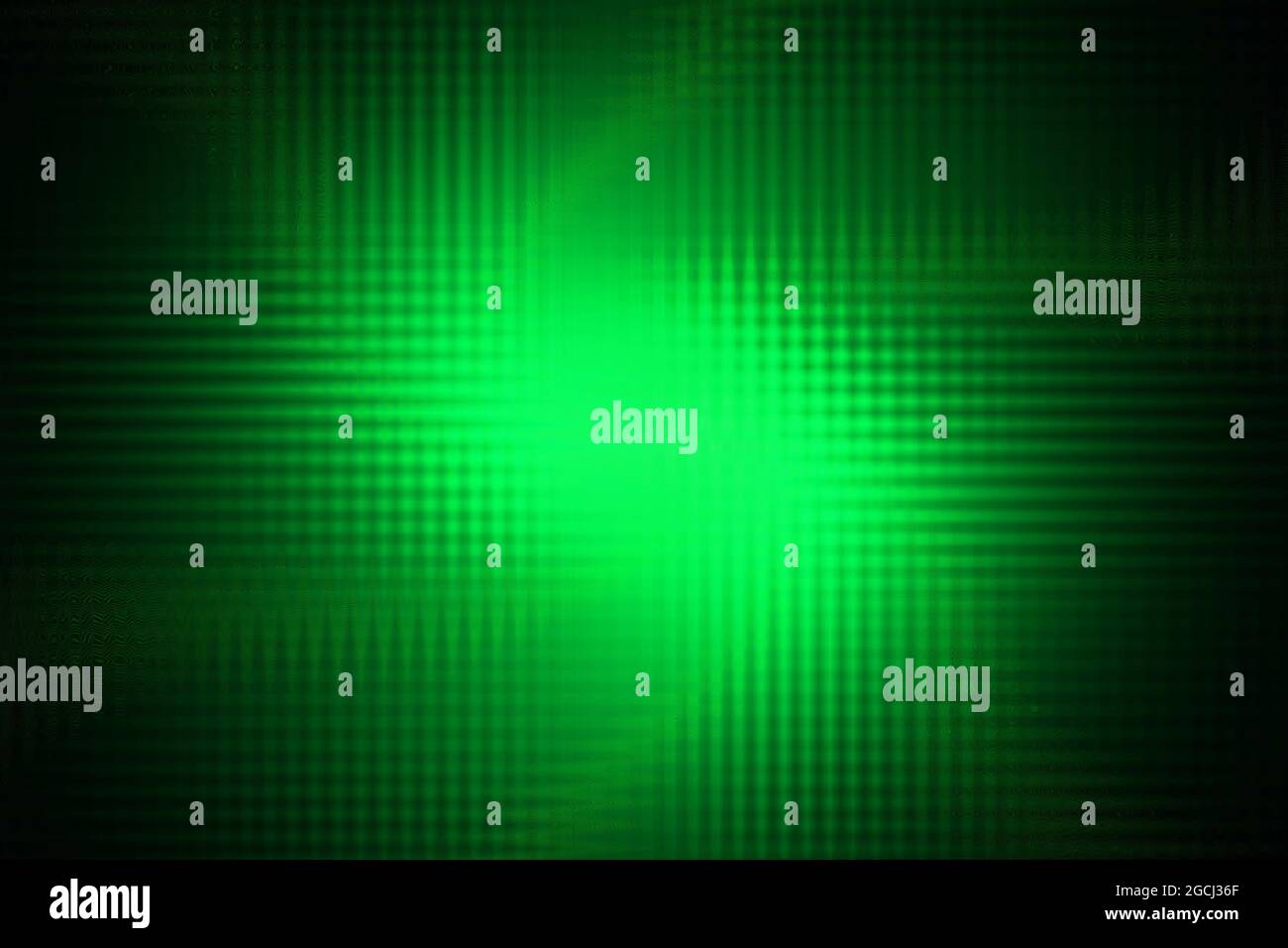 Glowing shiny object in the dark. Green blurred spot. Colorful neon ...