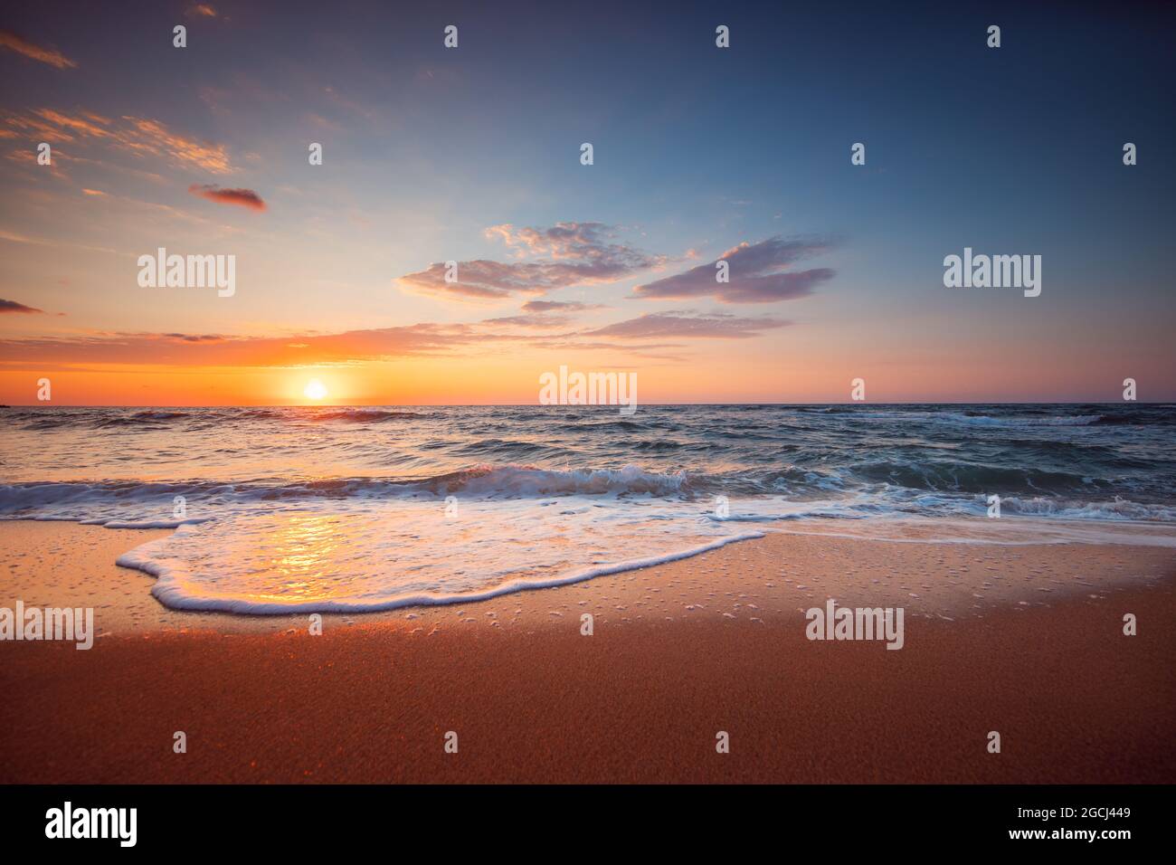 Bright sunset over ocean waves hi-res stock photography and images - Alamy