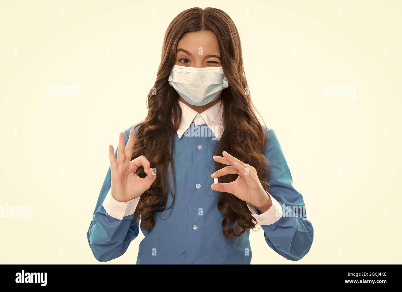 healthy child in protective mask against coronavirus offer pill for ...