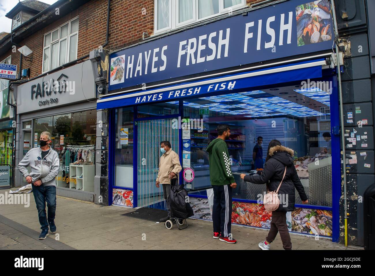 Hayes, London Borough of Hillingdon, UK. 5th August, 2021. Shoppers ...