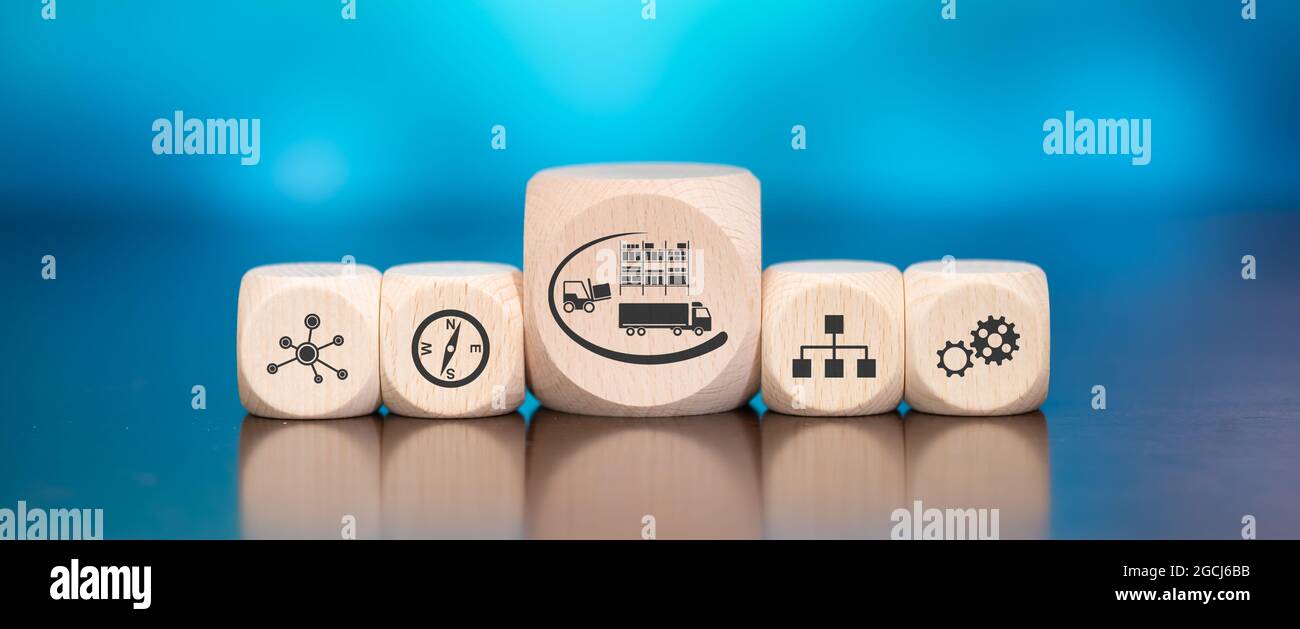 Wooden blocks with symbol of logistics concept on blue background Stock ...