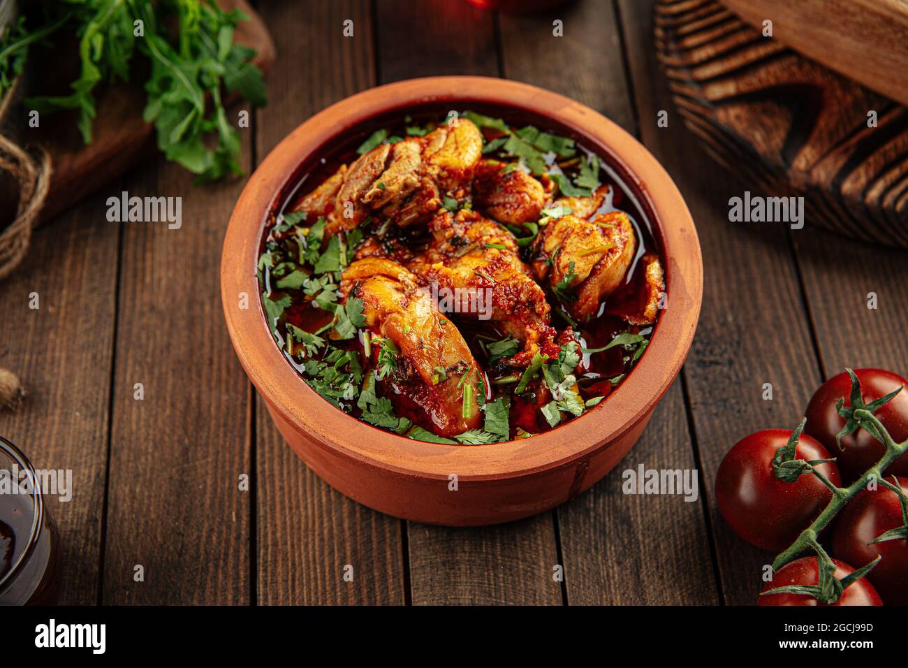 Georgian dish chakhokhbili stewed chicken Stock Photo - Alamy