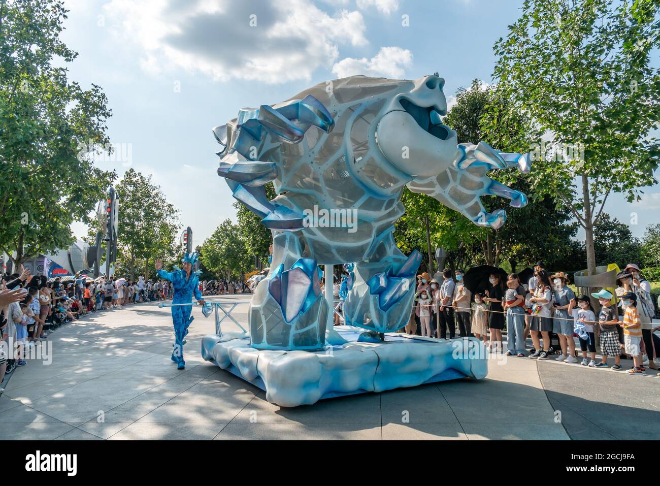 SHANGHAI, CHINA - AUGUST 8, 2021 - Tourists watch a float parade at ...