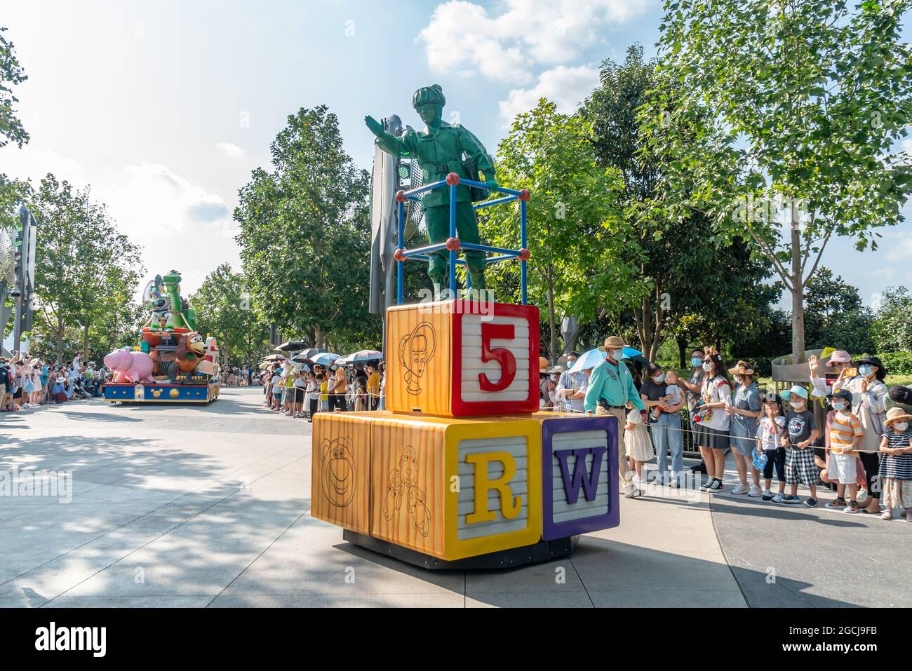 SHANGHAI, CHINA - AUGUST 8, 2021 - Tourists watch a float parade at ...