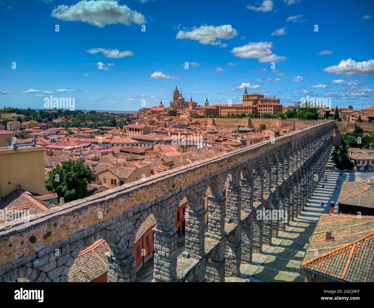 The famous ancient aqueduct of Segovia with the cathedral in the ...