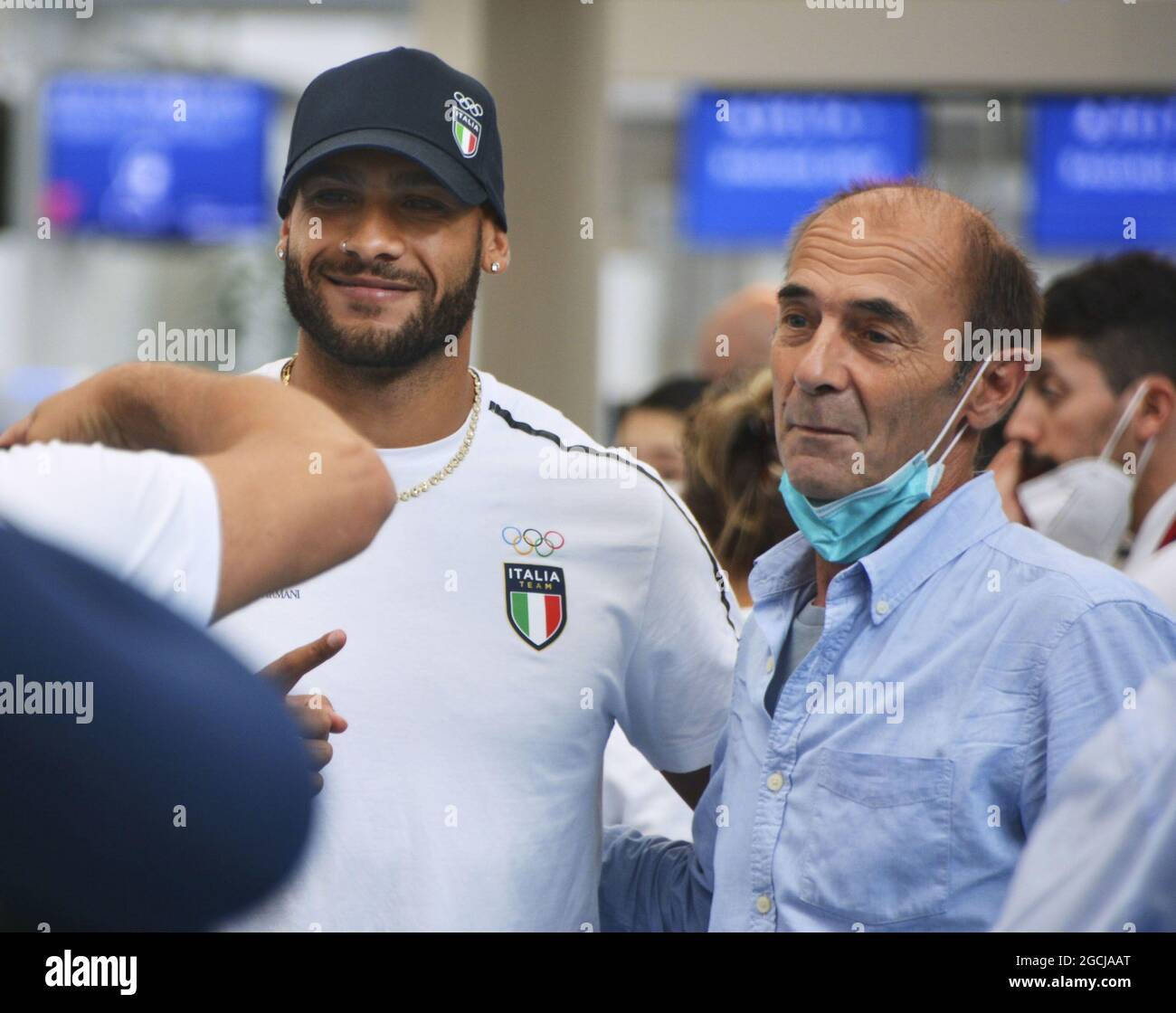Italian sprinter Lamont Marcell Jacobs (L), who won the men's 100 ...