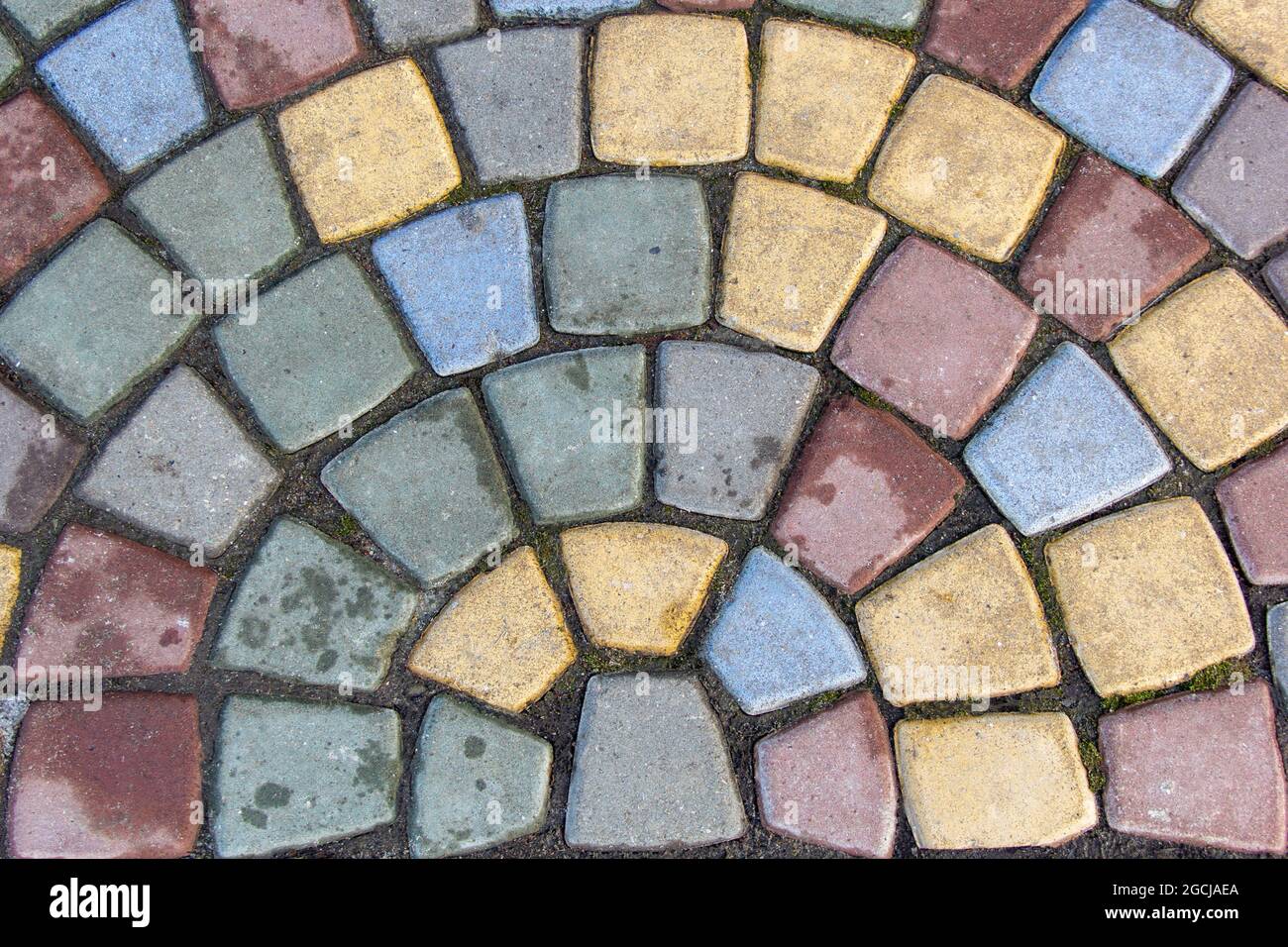 multi-color concrete paving slab. Beautiful pattern, background close ...