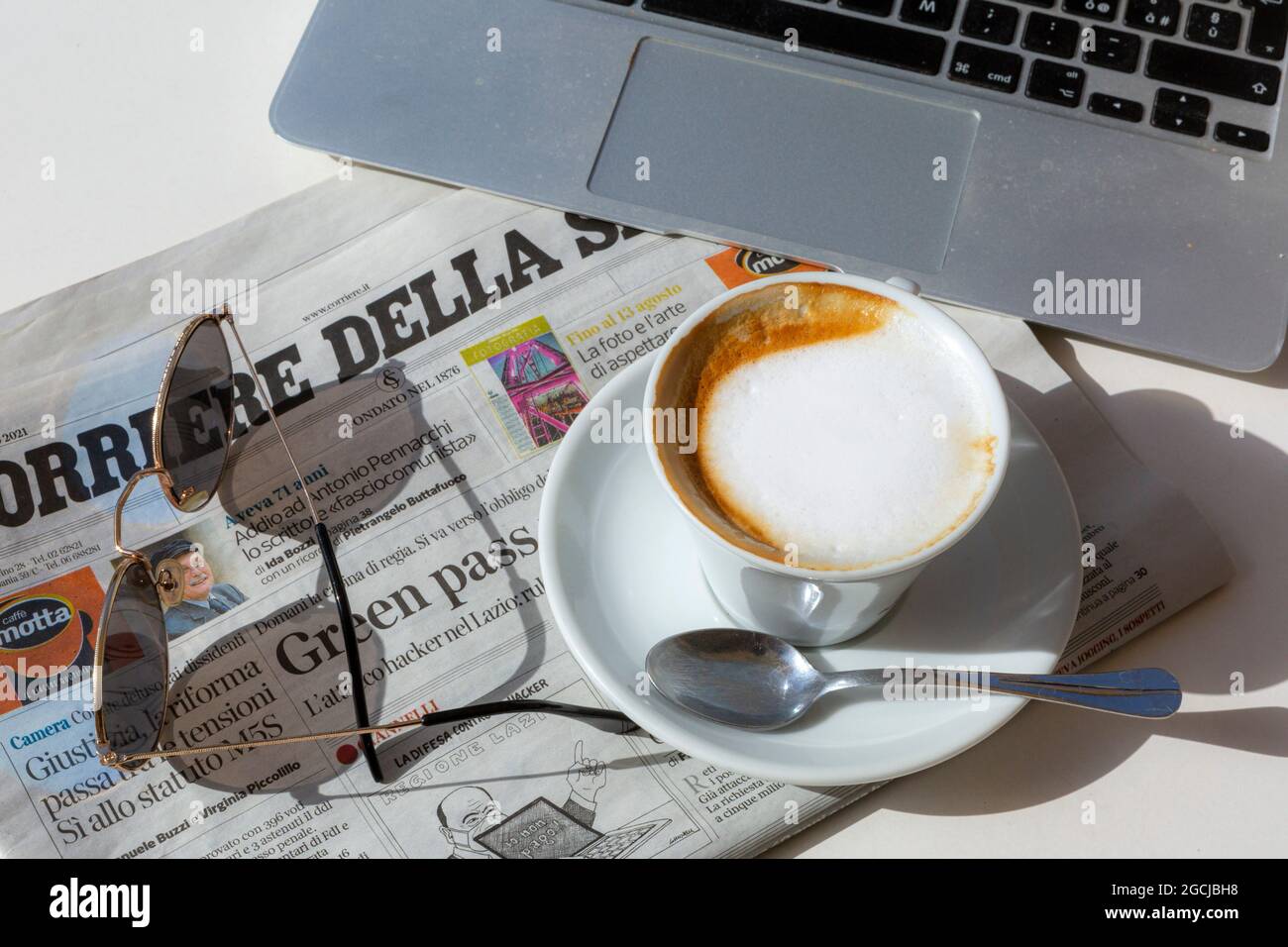 Breakfast with cappuccino and computer Stock Photo - Alamy