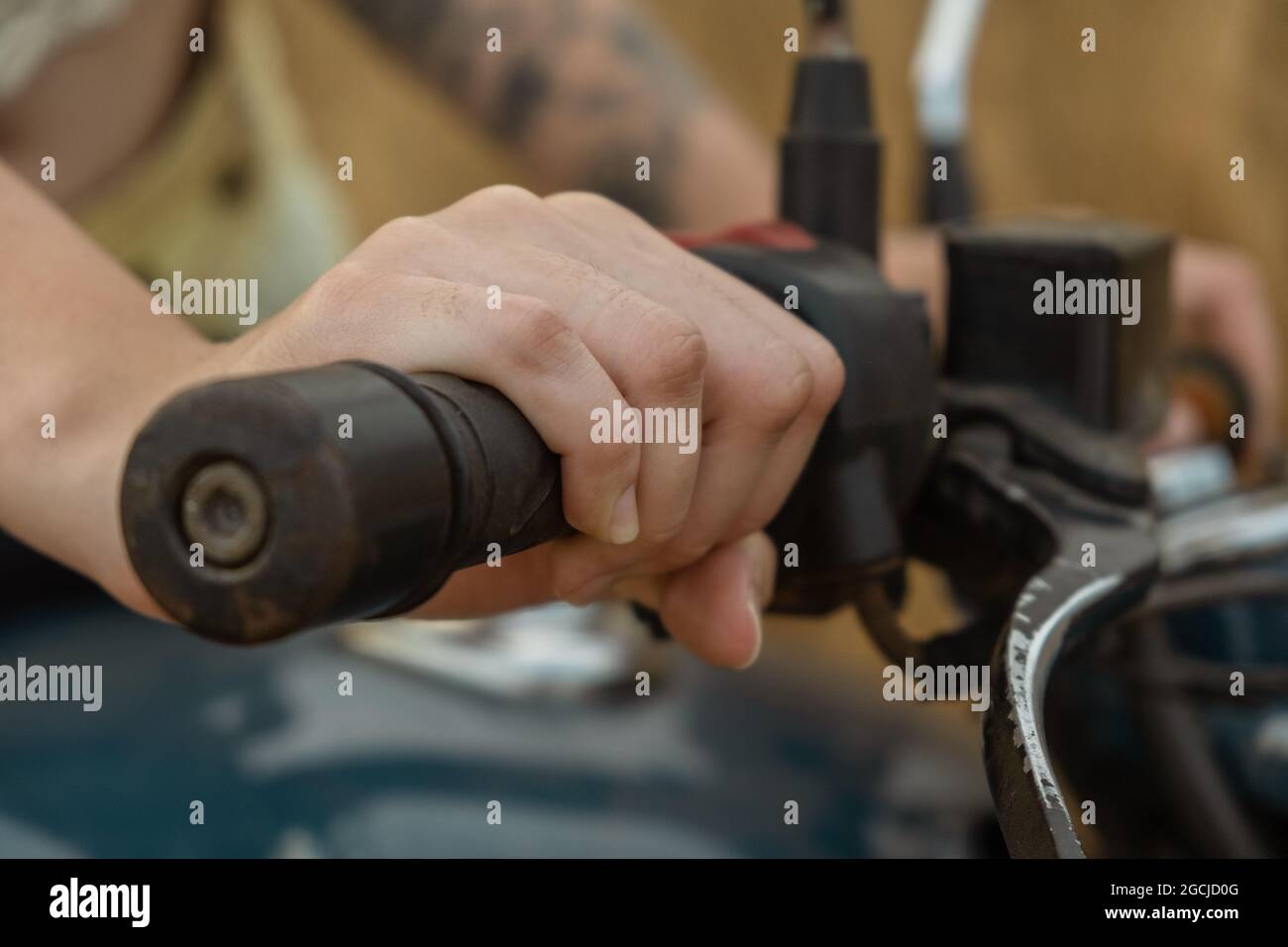 Holding motor hi-res stock photography and images - Alamy