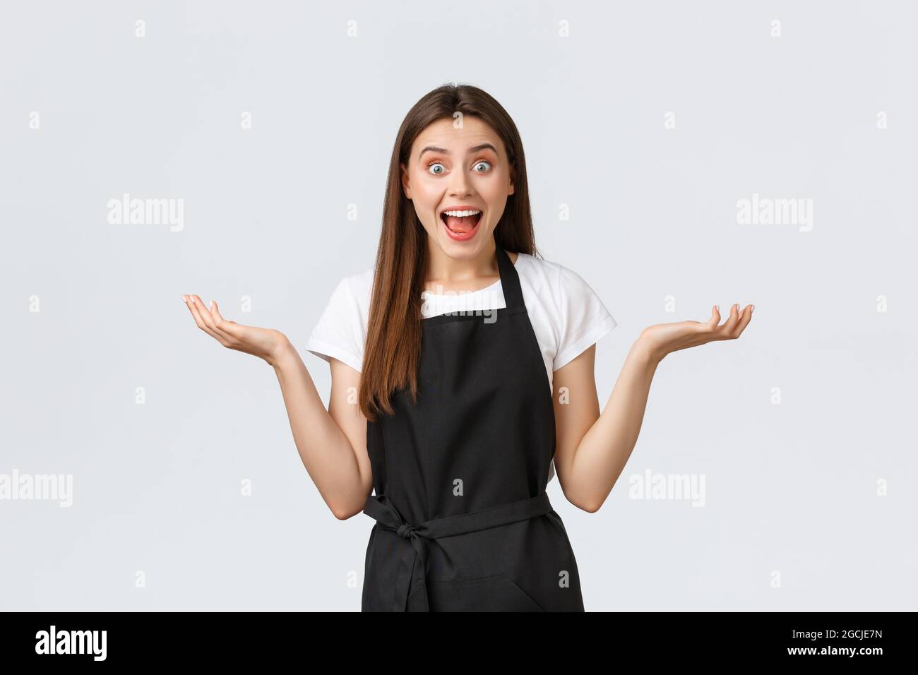 Small business, employees and coffee shop concept. Surprised and ...