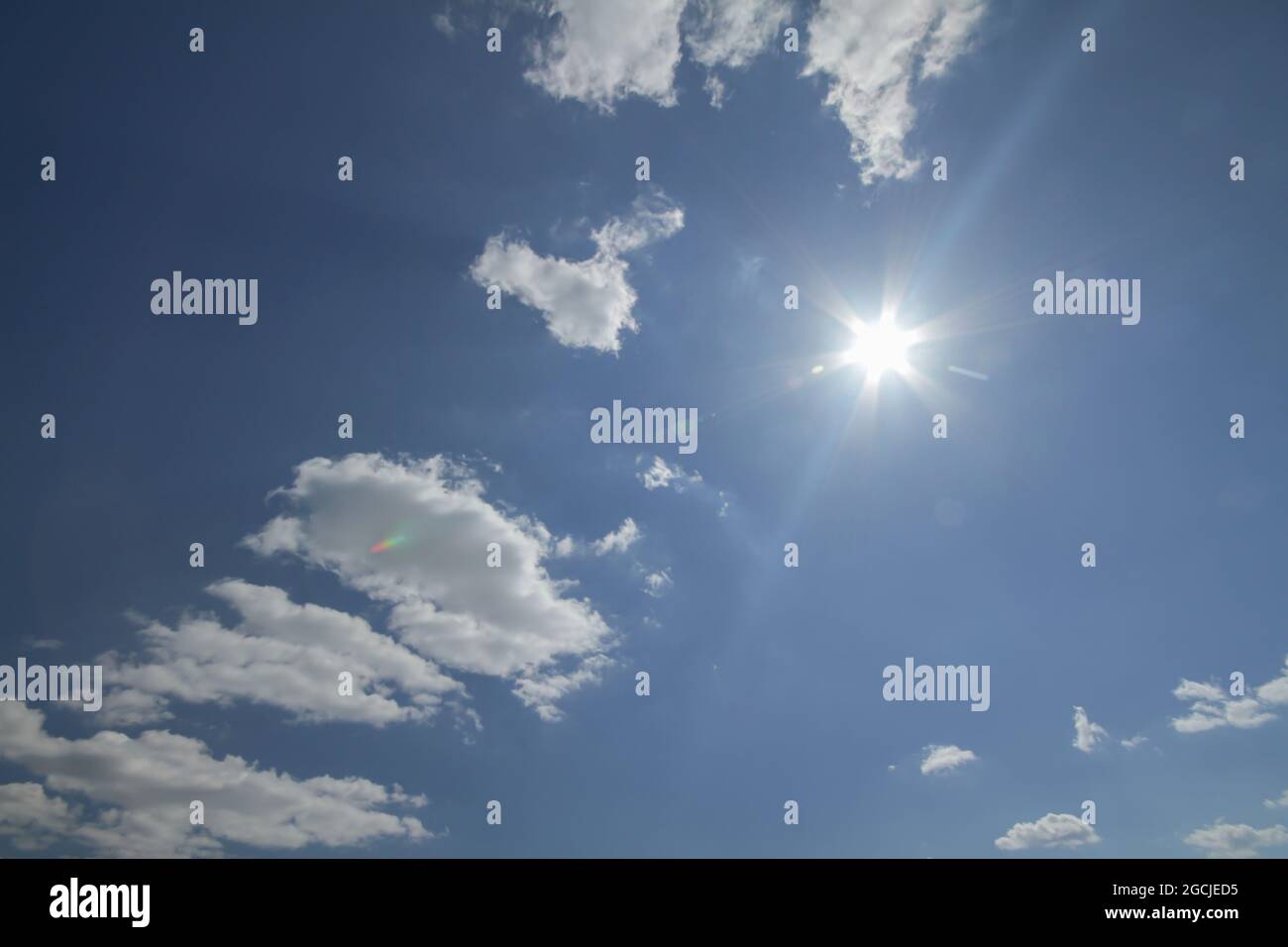 natural clouds blue sky sun ray light Stock Photo - Alamy