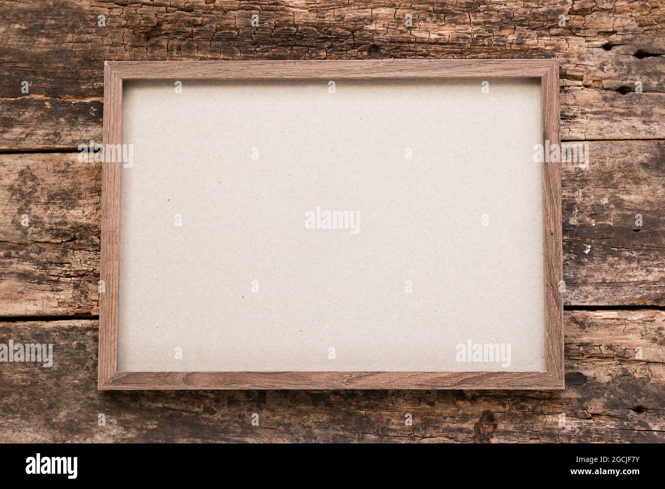 horizontal empty photo frame on wooden background mockup Stock Photo ...