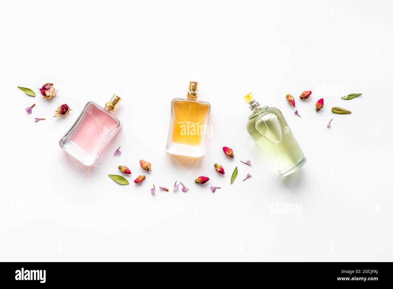Floral fragrance - perfume bottles with flowers, top view Stock Photo ...