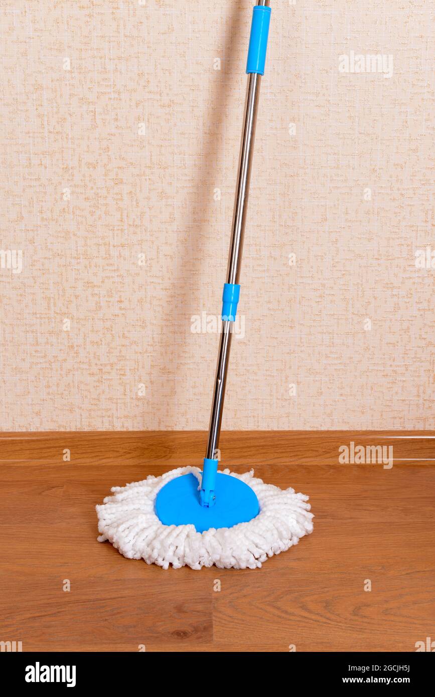 House cleaning with mop Stock Photo - Alamy