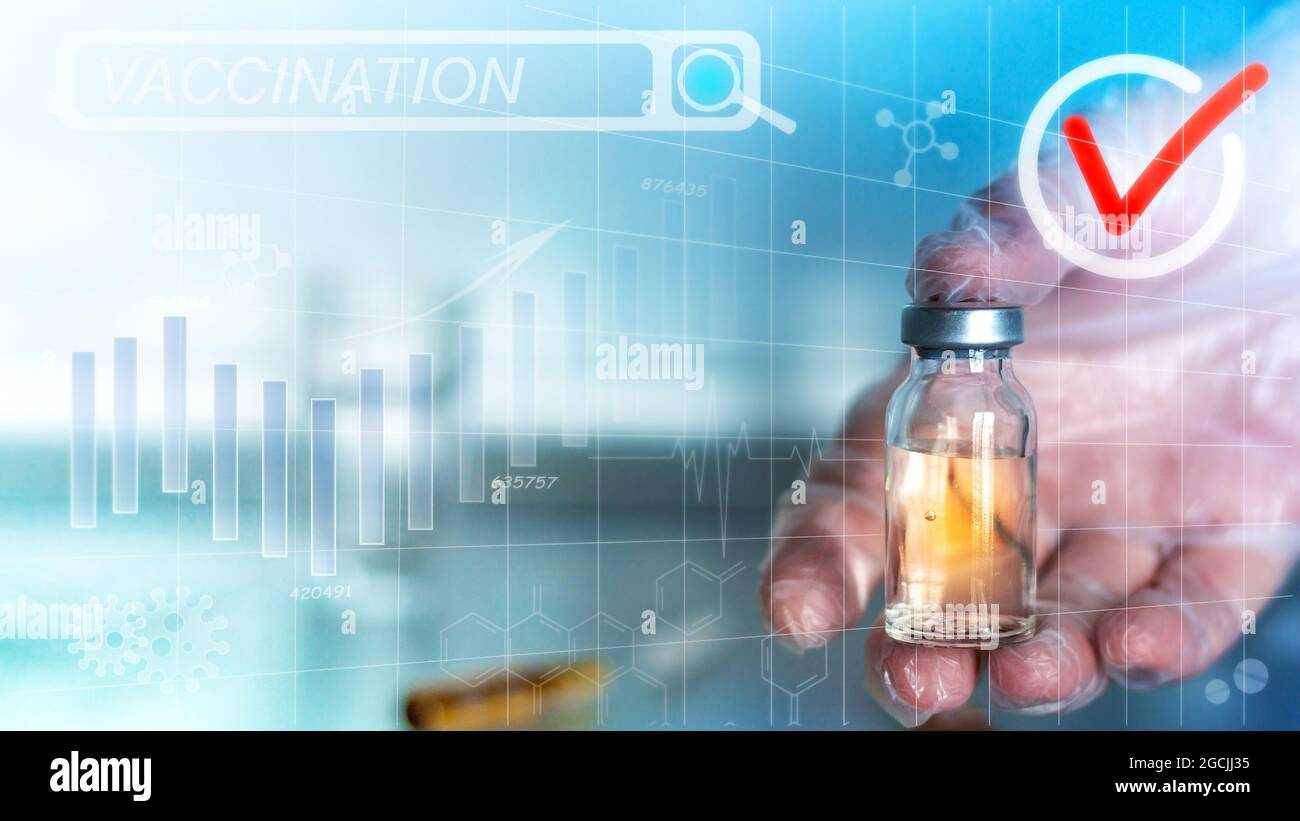 vaccine against the virus in the doctor's hand on the background of the ...