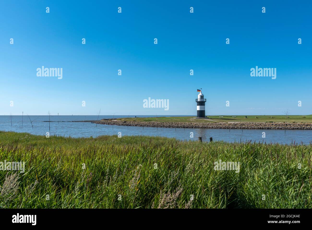 Coastal landscape with the lighthouse Little Prussian in the background ...