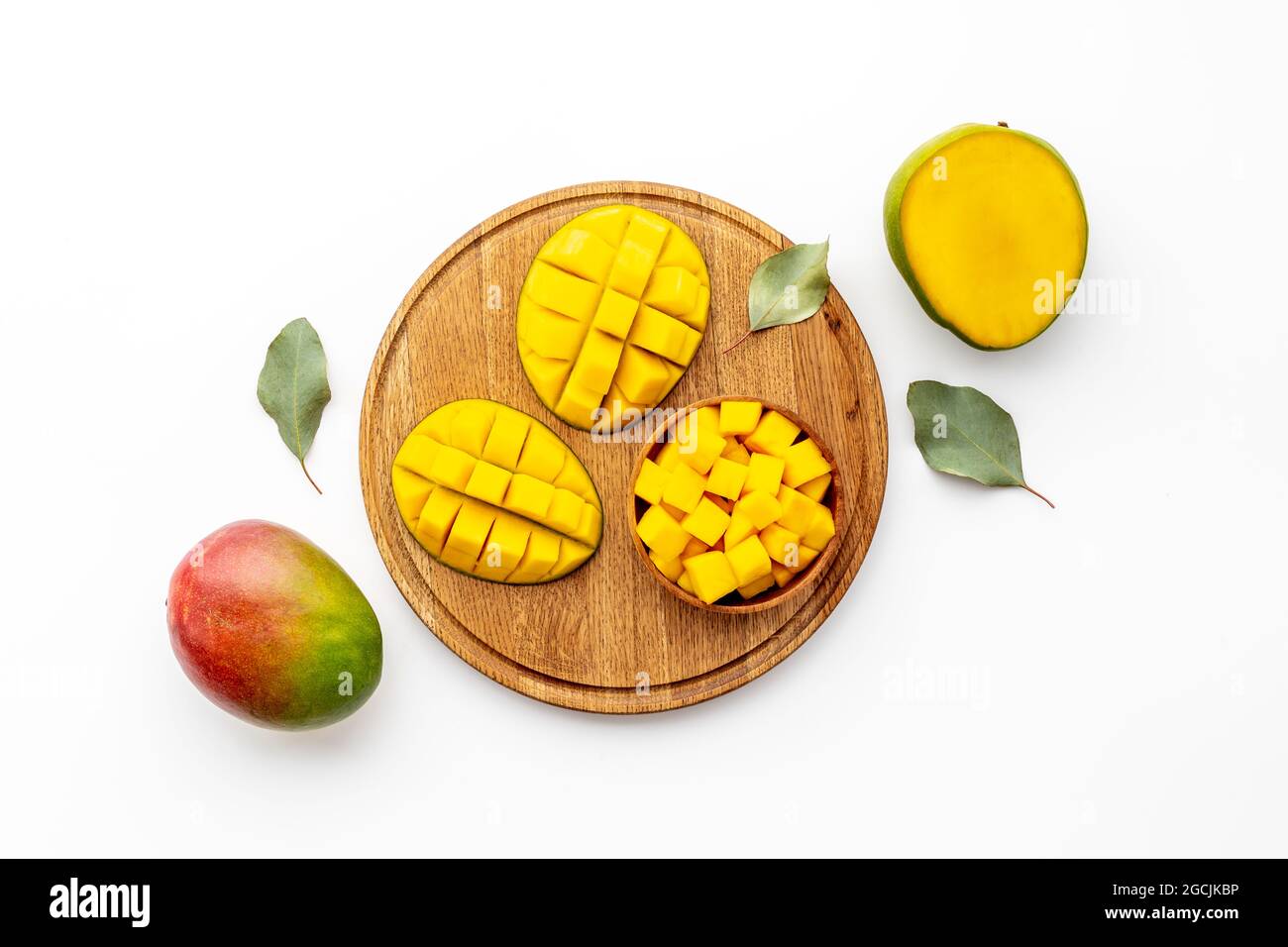 Mango fruit and mango cubes in bowl. Fruits background Stock Photo - Alamy