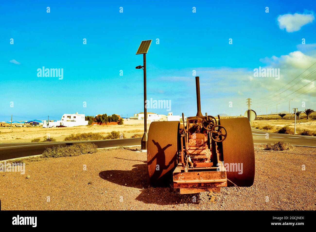 Old rusty tractor in the construction site Stock Photo - Alamy