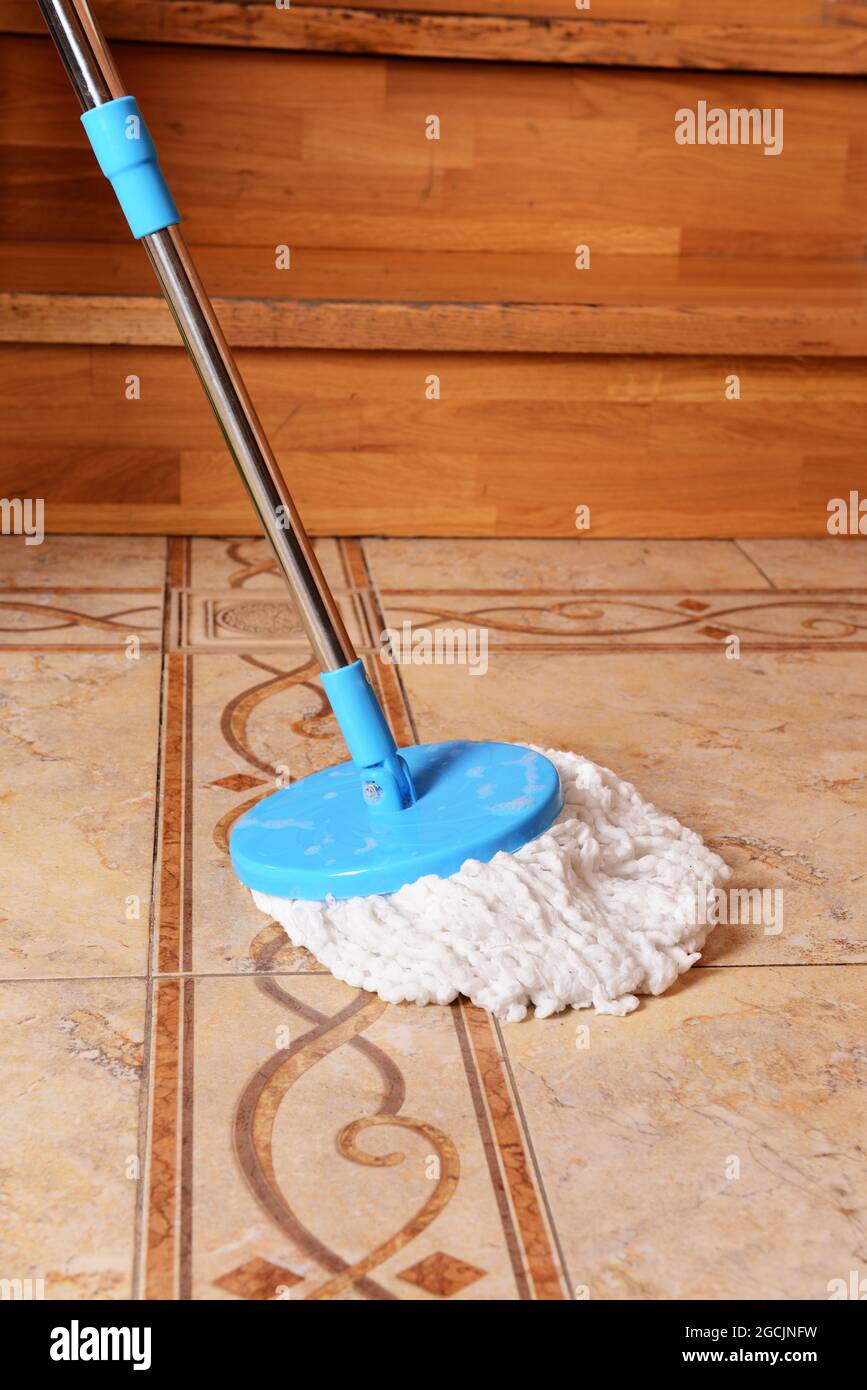 House cleaning with mop Stock Photo - Alamy