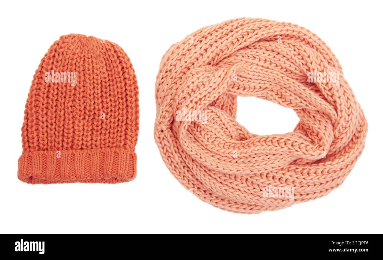 Warm knitted clothing isolated on white Stock Photo - Alamy