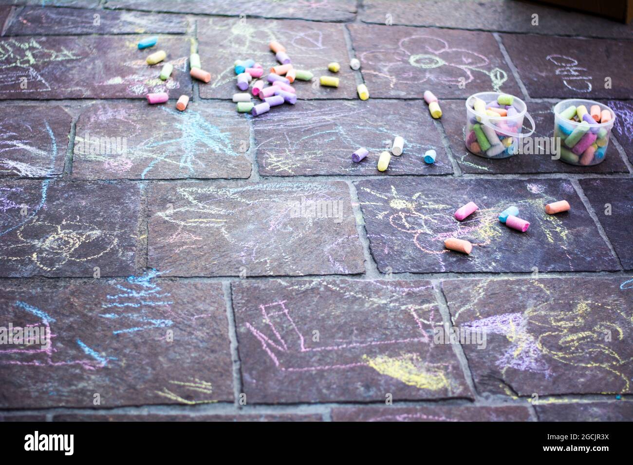 Child painting on floor colorful hi-res stock photography and images ...