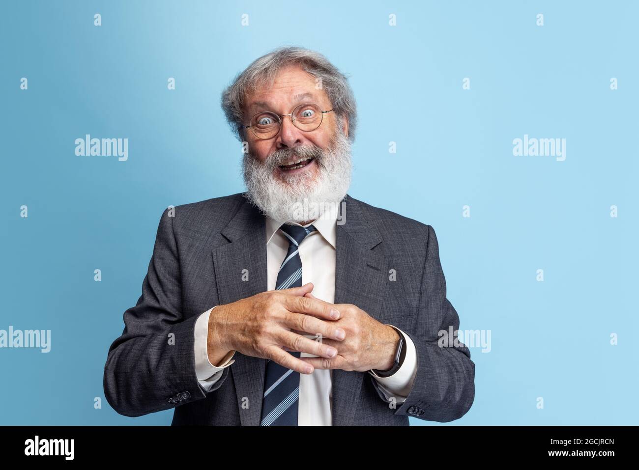 Crazy professor, teacher, gray-headed bearded man posing isolated on ...