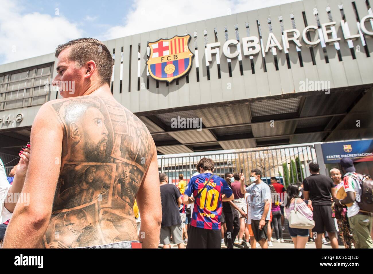 Barcelona, Catalonia, Spain. 8th Aug, 2021. Lionel Messi fan with a tattoo on his back with the ...