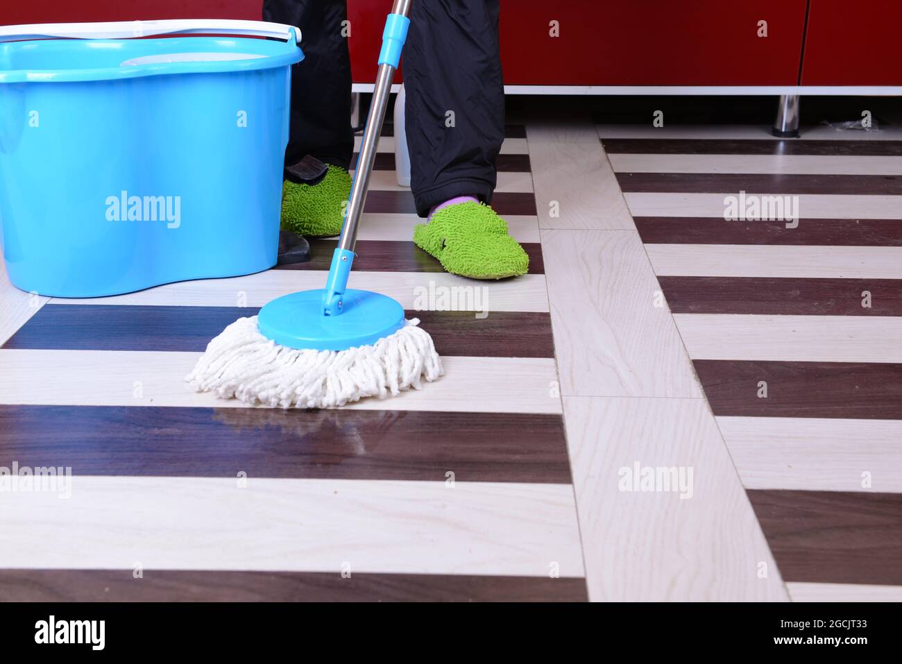 House cleaning with mop Stock Photo - Alamy