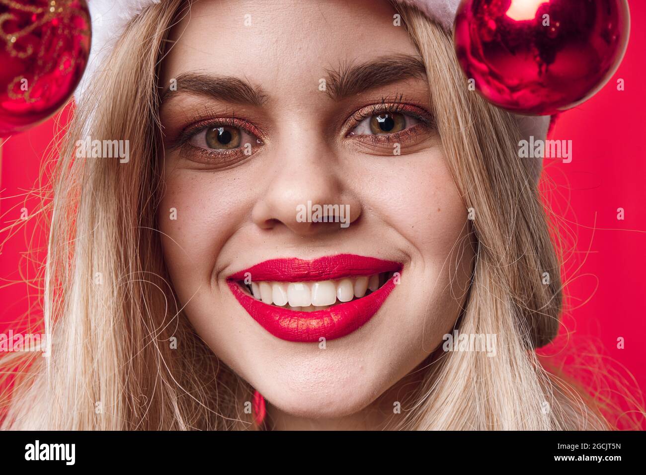 woman with red lips bright makeup face closeup red background Stock ...