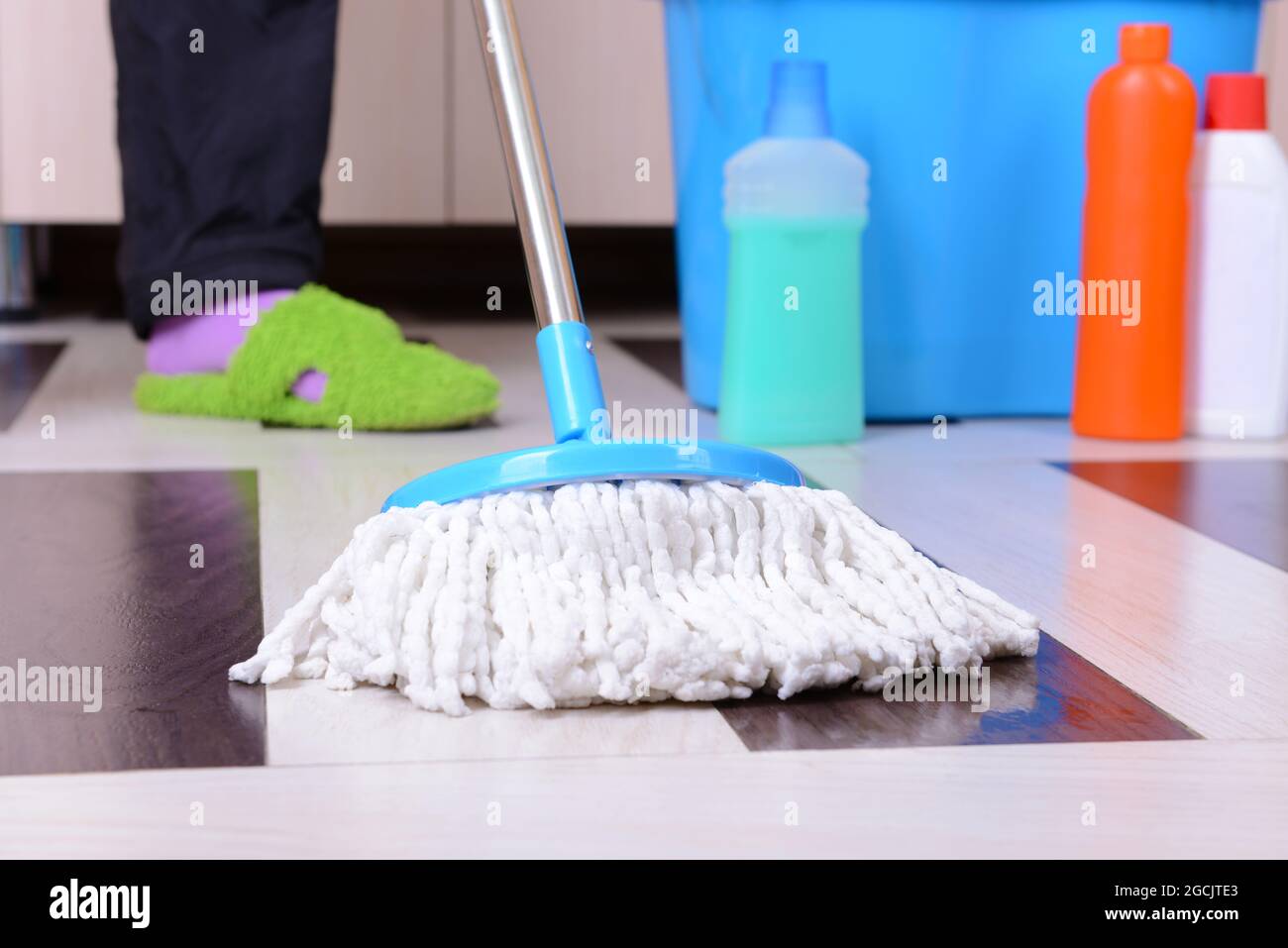 House cleaning with mop Stock Photo - Alamy