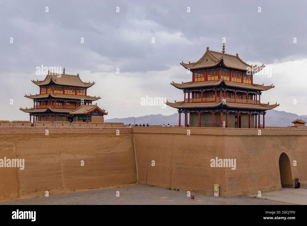 The walls and houses of the Great Wall Jiayuguan Pass in China have ...