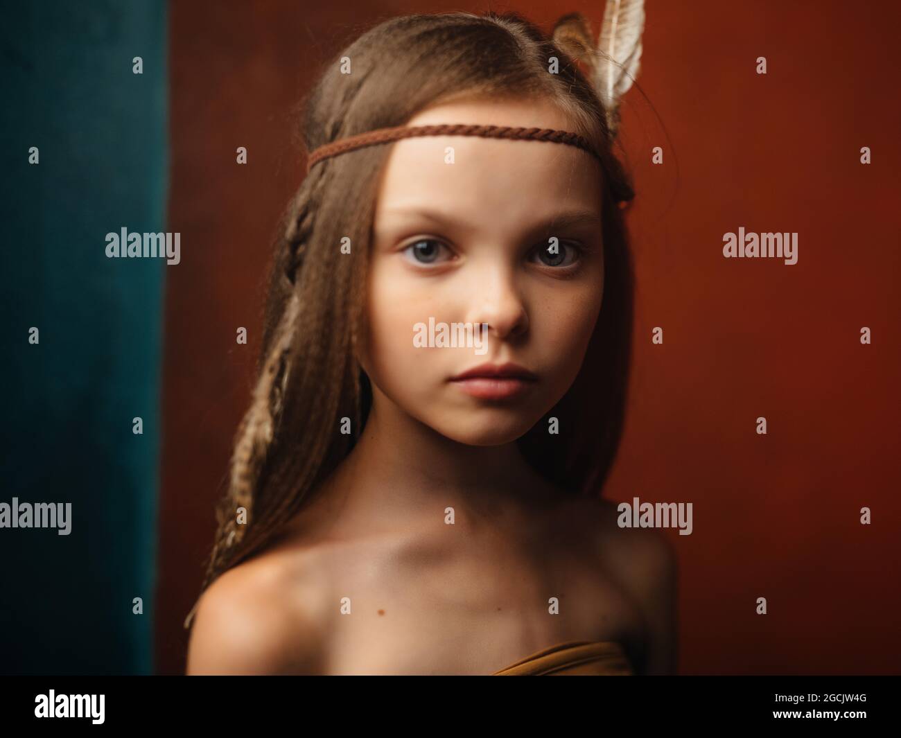 girl with ethnic hairstyle native american apache red background Stock ...