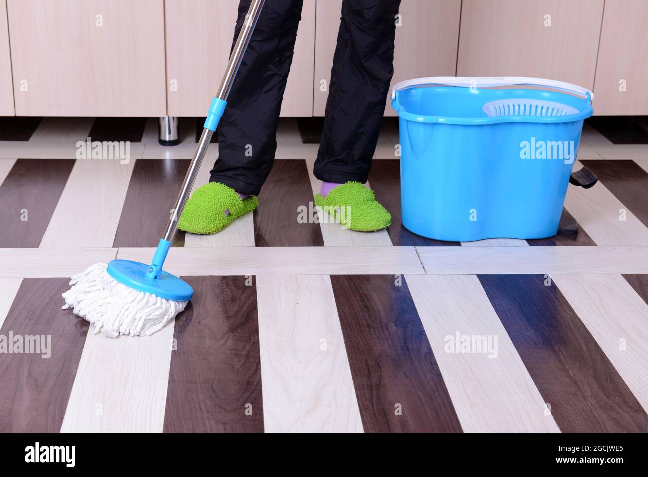 House cleaning with mop Stock Photo - Alamy