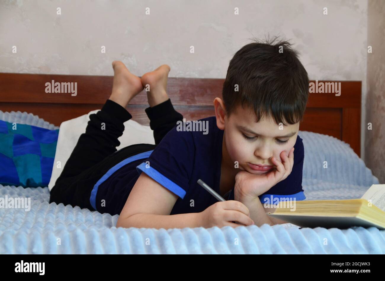 Boy doing housework hi-res stock photography and images - Alamy