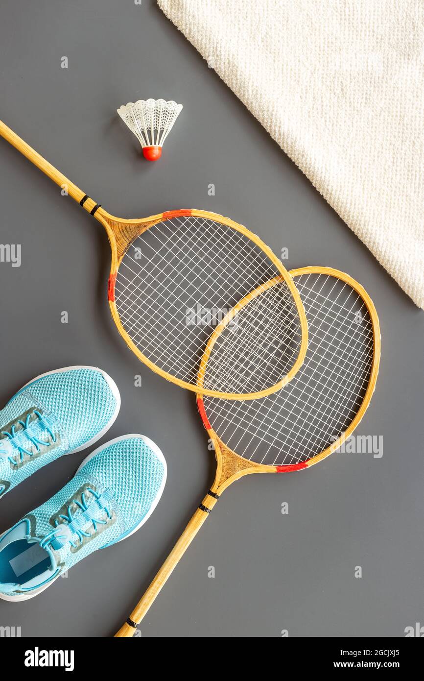 Competitive sports equipment. Two badminton rackets and shuttlecock ...