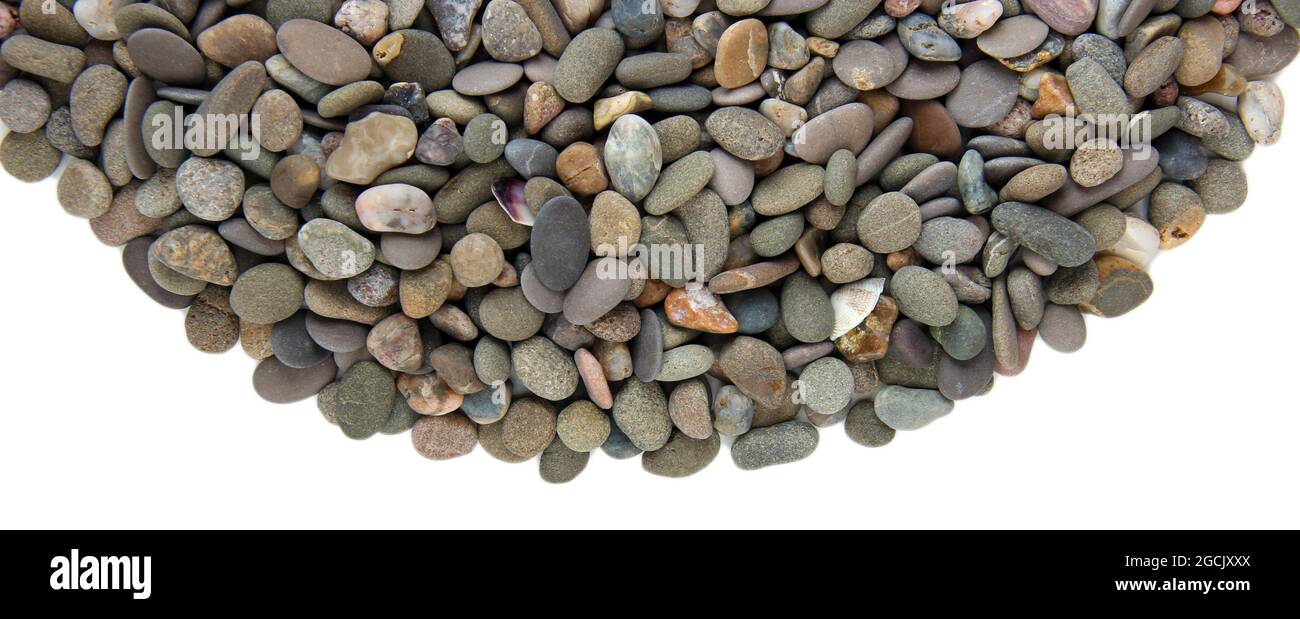 Small sea stones, isolated on white Stock Photo - Alamy